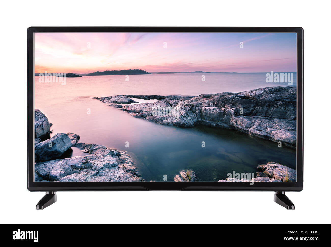 Modern high-definition television with picture of the sunset ro Stock ...