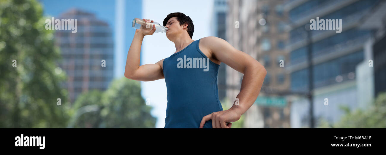 Man drinking water handsome hi-res stock photography and images - Alamy