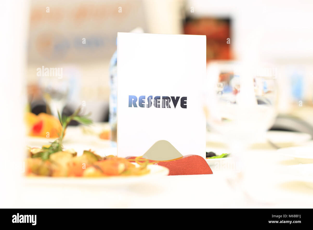 catering table set service with silverware and glass Stock Photo - Alamy