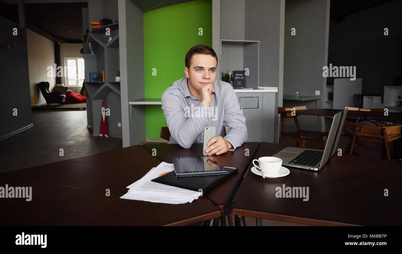 Portrait of successful young male businessman who posing and loo Stock ...