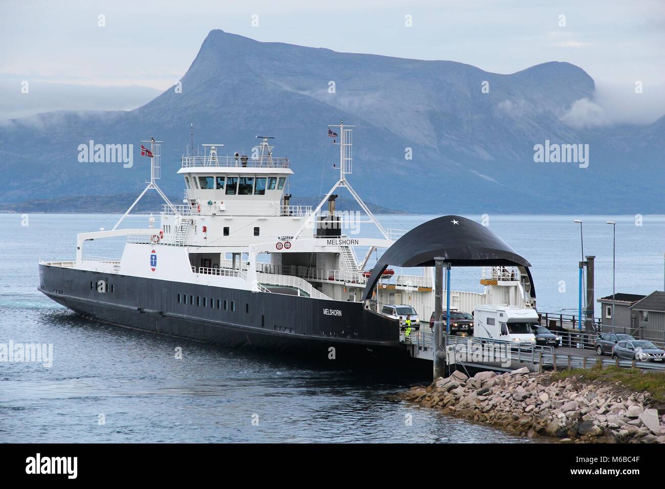 BOGNES, NORWAY - JULY 25, 2015: People disembark Torghatten Melshorn ...