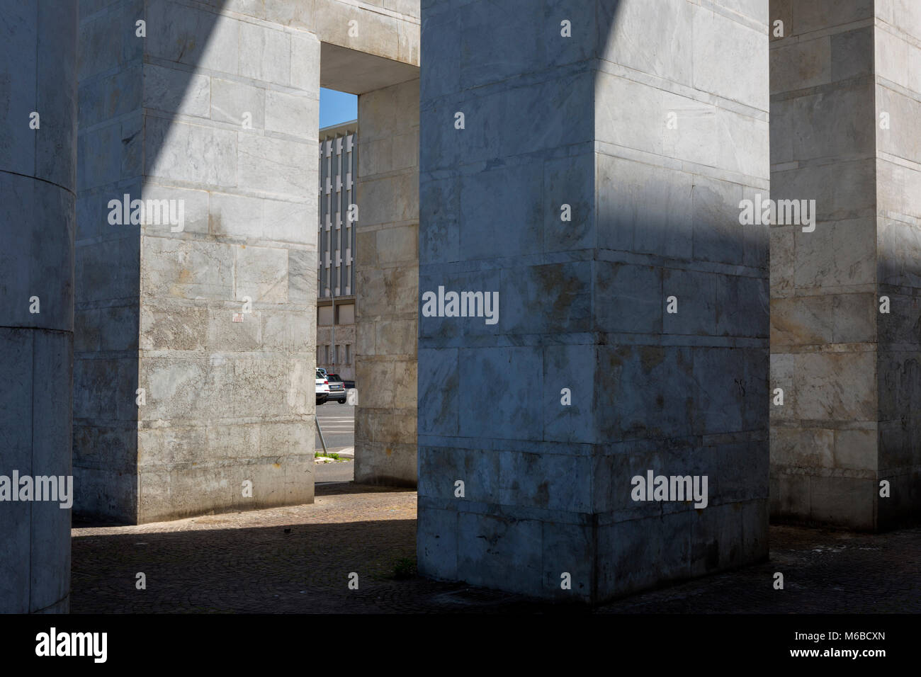Abstract anonymous view of modern square stone columns in the EUR ...