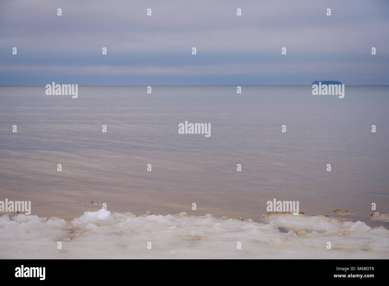 Ice along the beach at winter Stock Photo - Alamy
