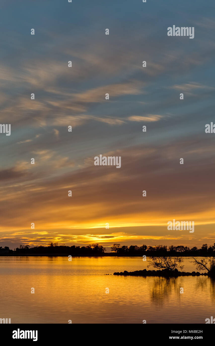 Colorful sunset at lake Stock Photo - Alamy