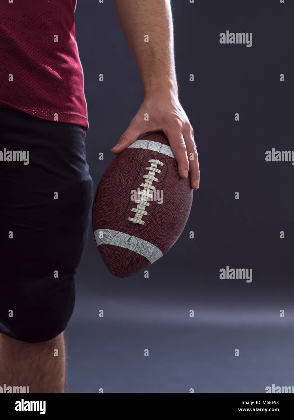 Closeup Portrait of a strong muscular American Football Player isolated ...