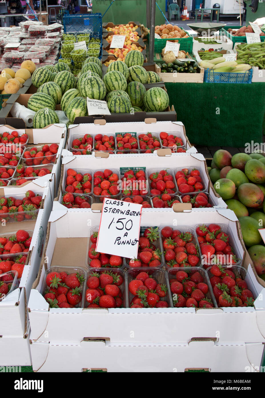 Locally grown strawberries, fresh from the farm, for sale on a marklet ...