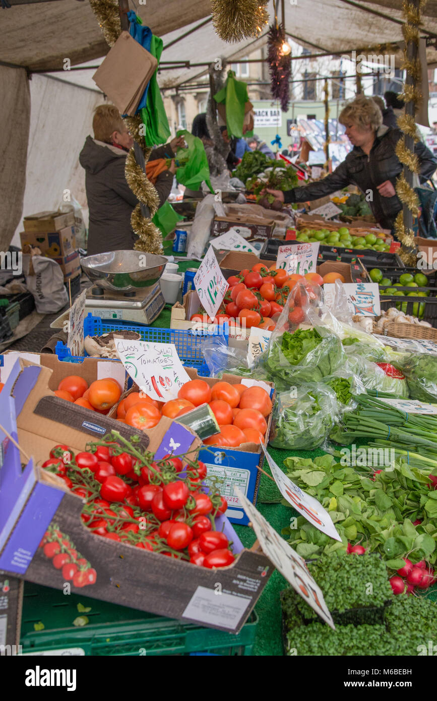 A busy day as shoppers purchase fresh produce at Boston Market ...