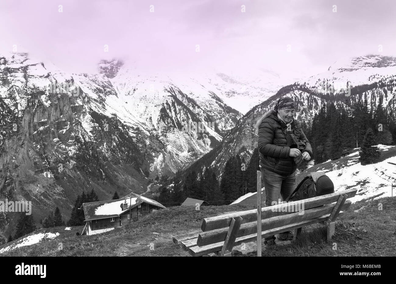 Photographer at work in Swiss alps Stock Photo - Alamy