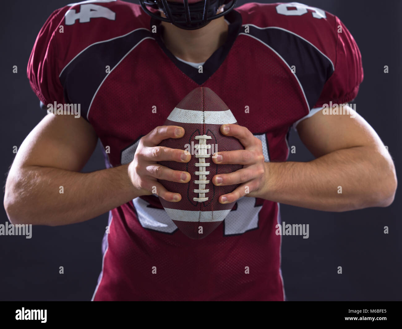 Closeup Portrait of a strong muscular American Football Player isolated ...