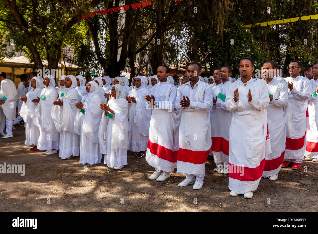 Ethiopian Orthodox Christians Dressed In Traditional White Celebrate ...