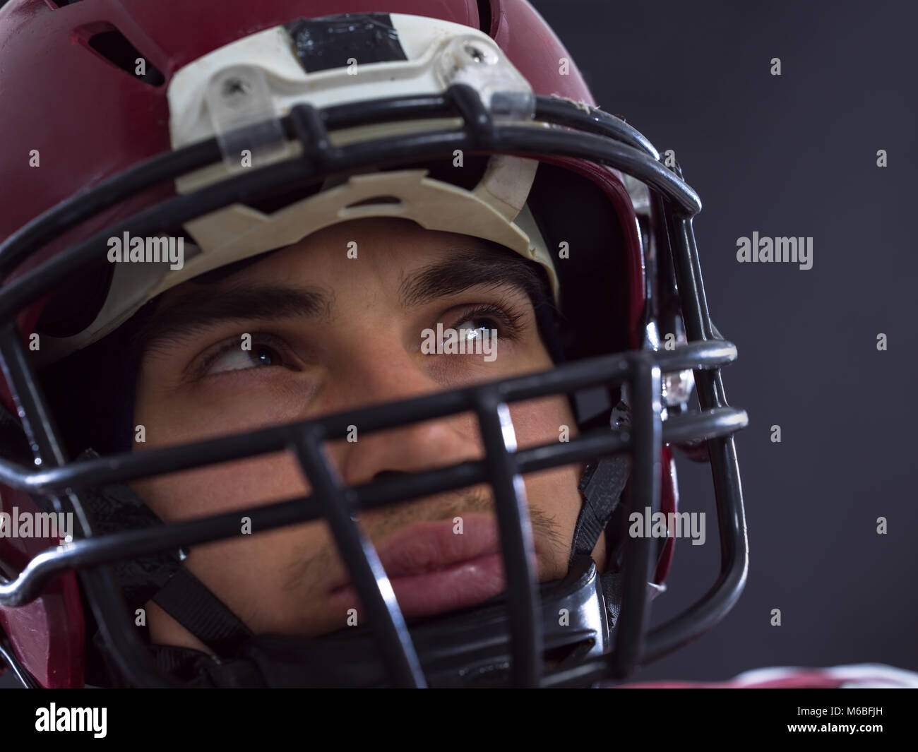 Closeup Portrait of a strong muscular American Football Player isolated ...