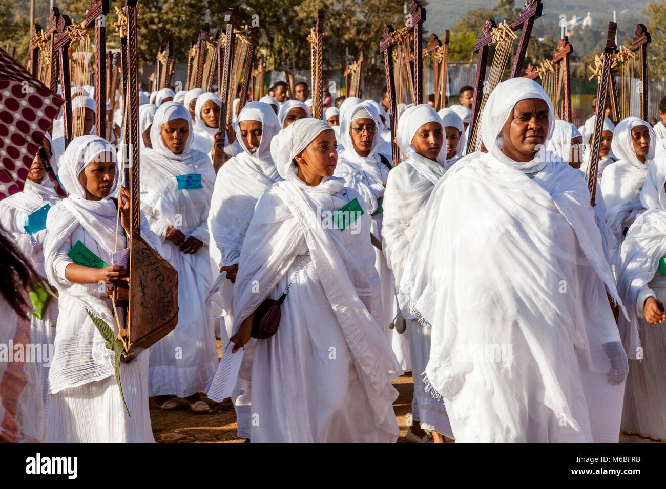 A Procession Of Female Ethiopian Christians Carrying Begenas Arrive At ...