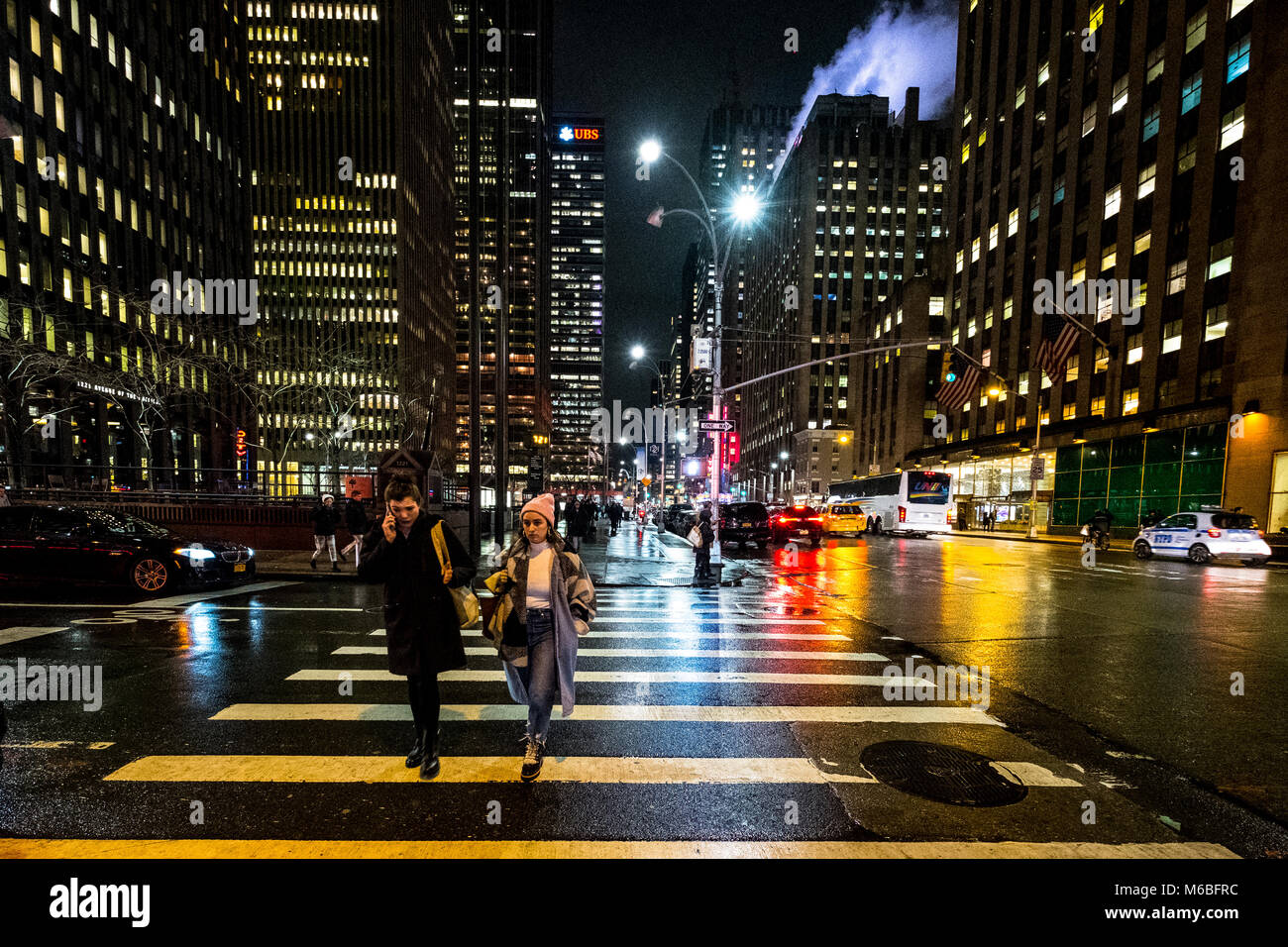 New York City, USA, midtown dark evening night illuminated street road ...