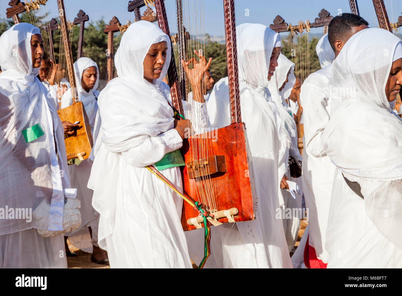 A Procession Of Female Ethiopian Christians Carrying Begenas Arrive At ...