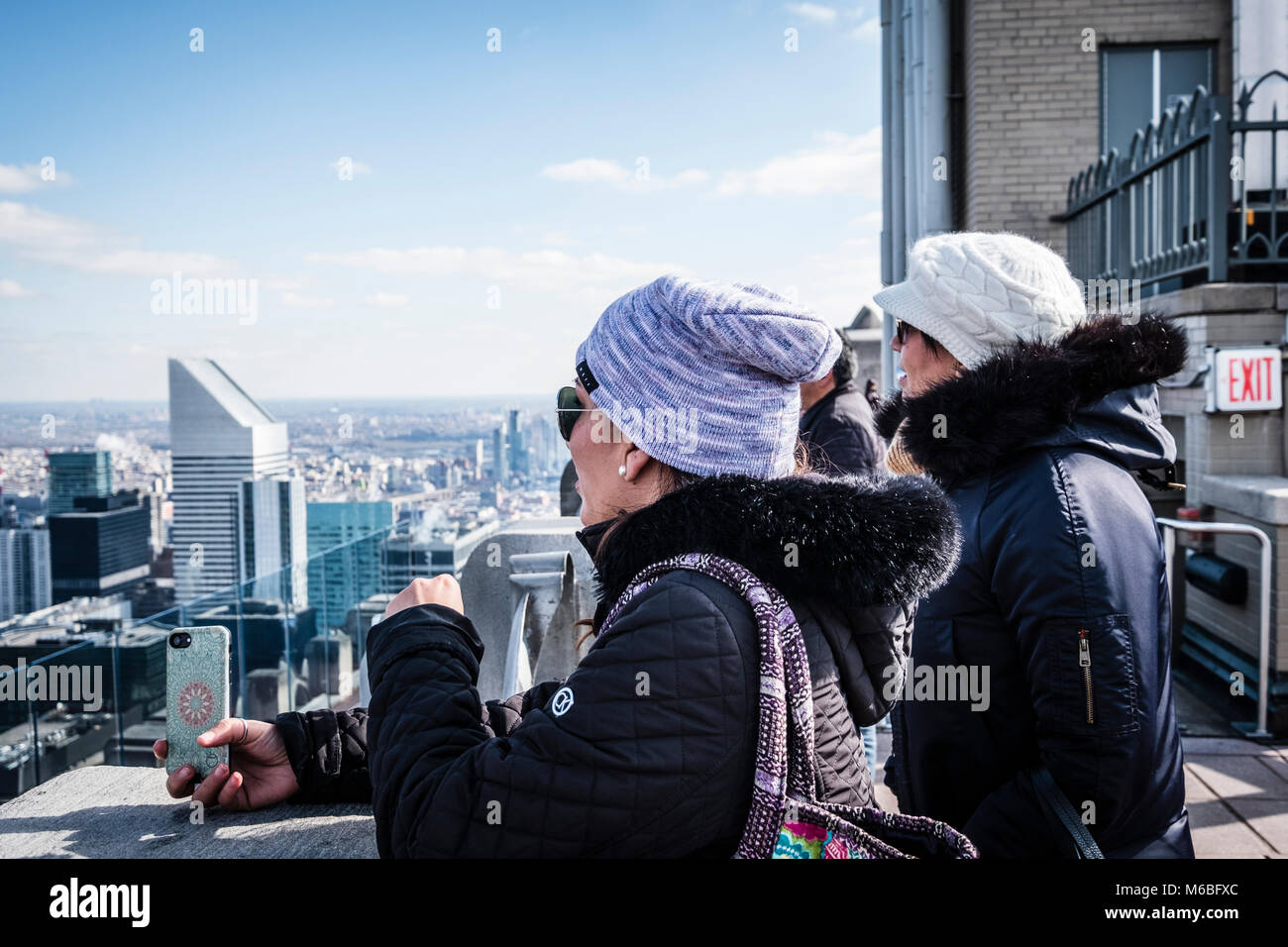 Tourist and locals at the Top of the Rock Observatory, Feb. 2018 Stock ...