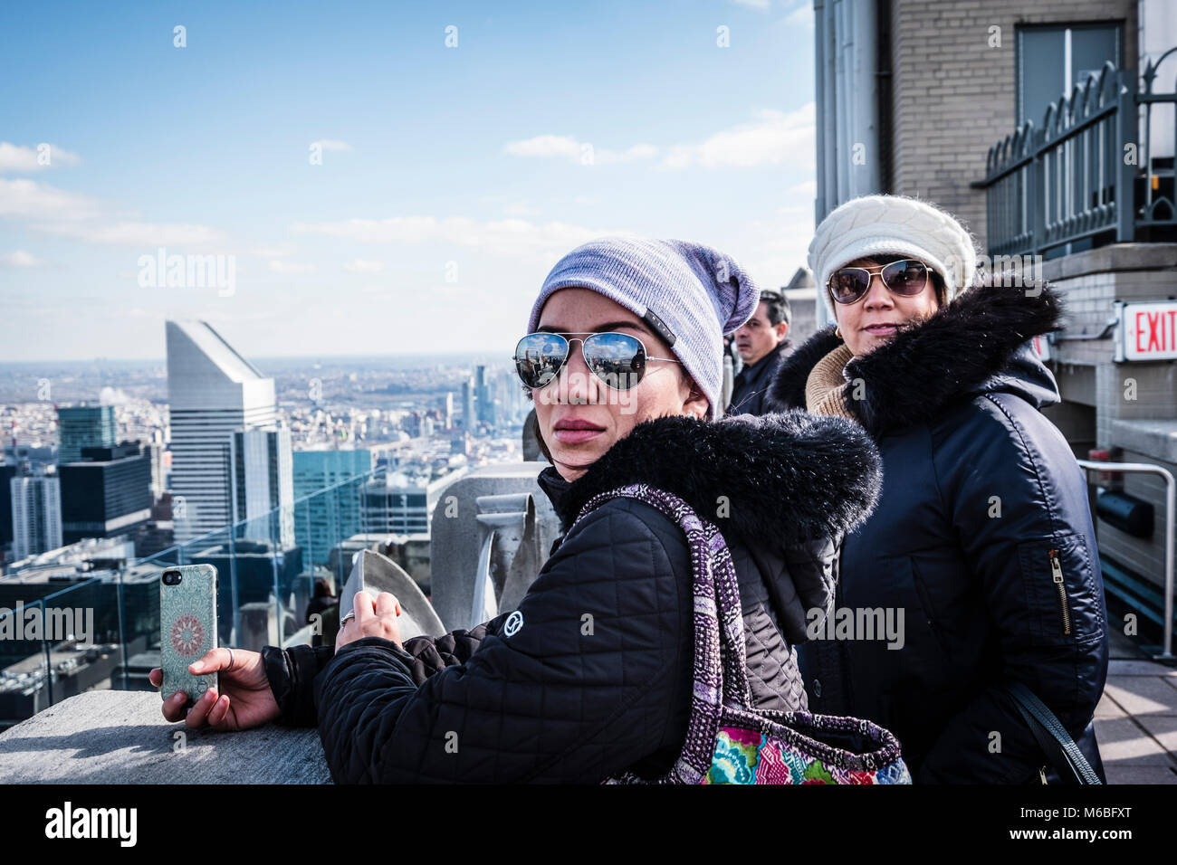 Tourist and locals at the Top of the Rock Observatory, Feb. 2018 Stock ...