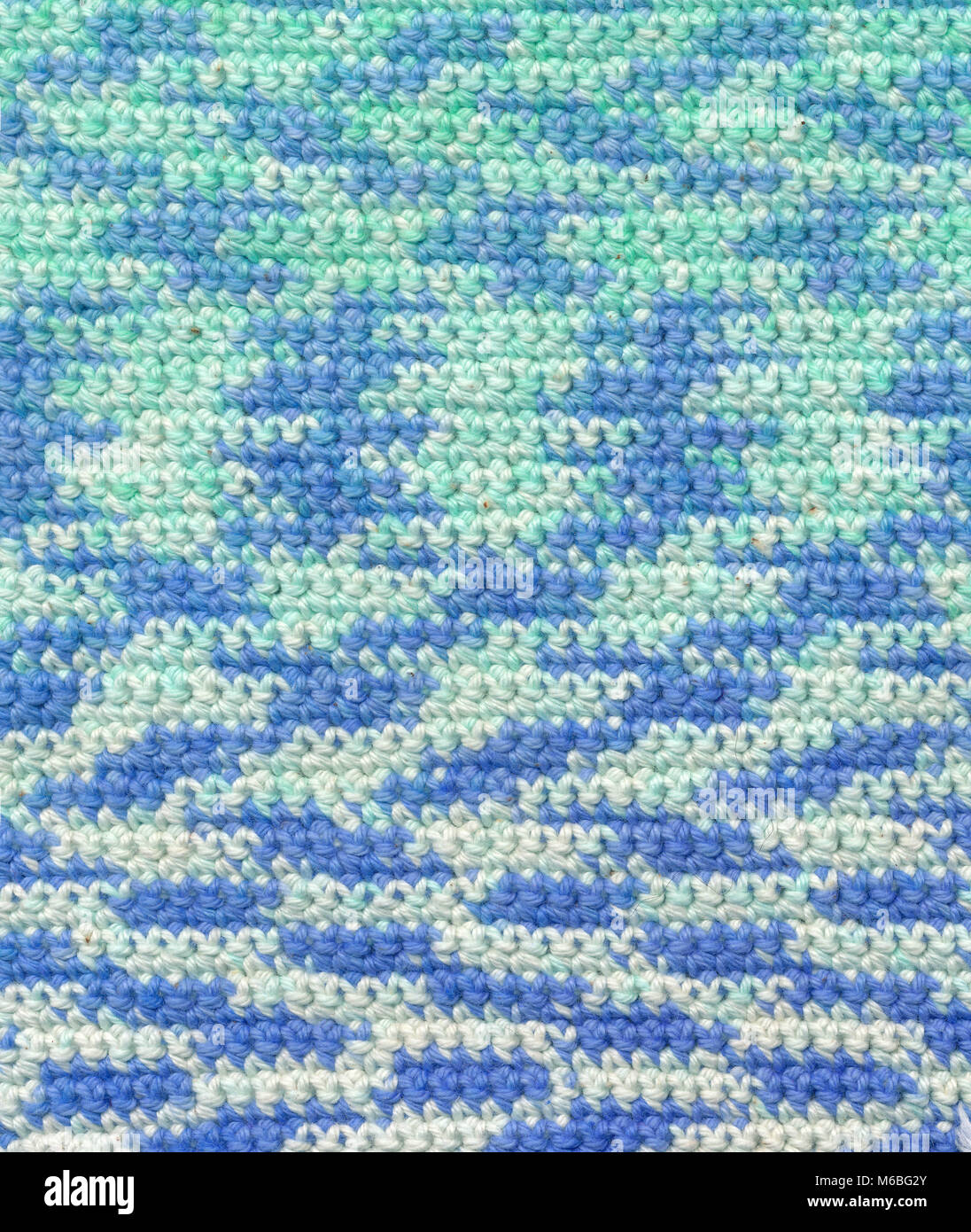 Textile, abstract crochet background in blue and green Stock Photo - Alamy