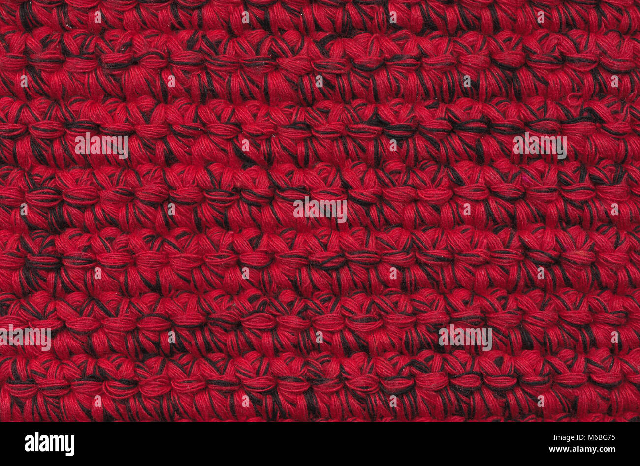 Textile abstract crochet background in red and black Stock Photo - Alamy
