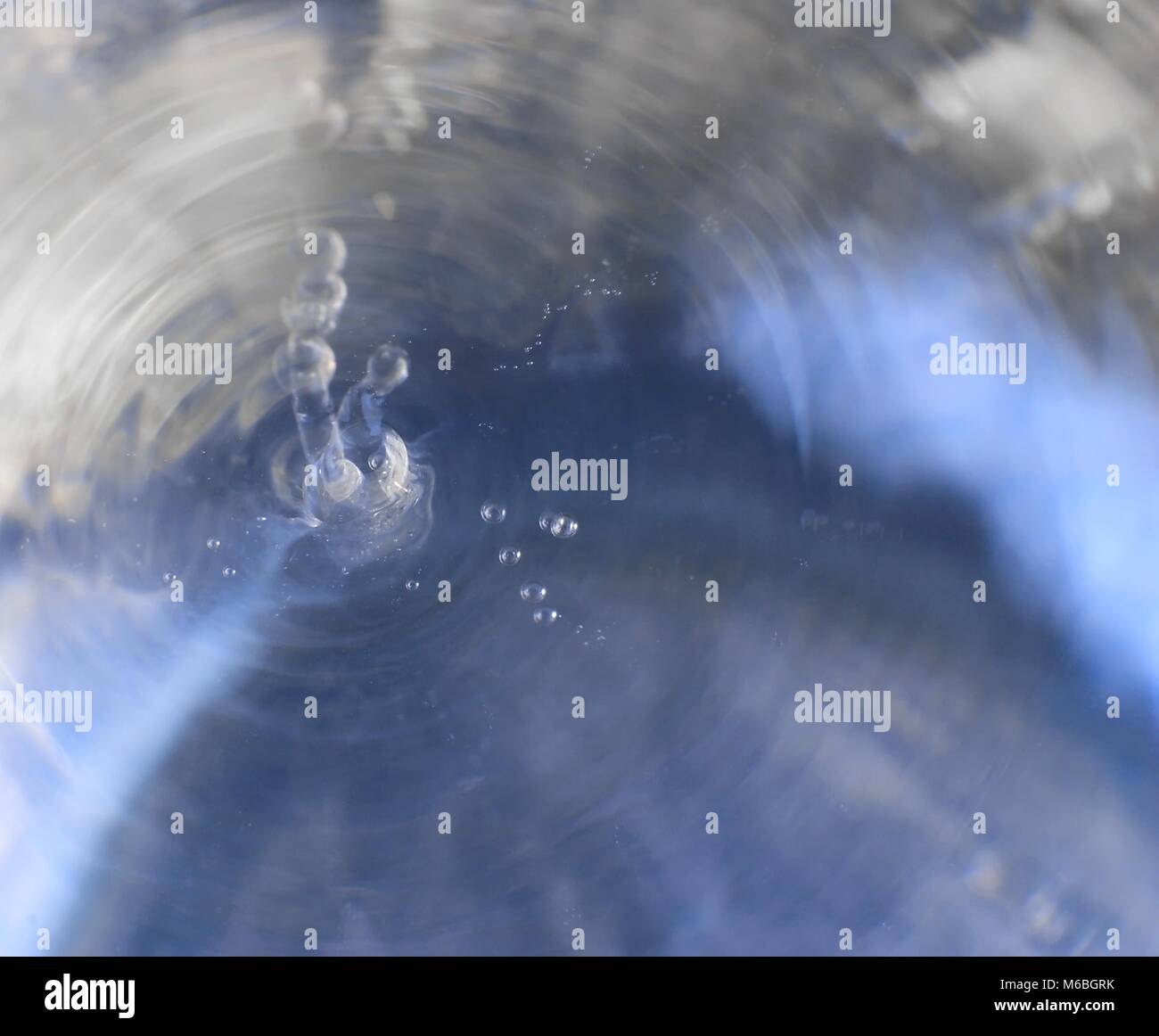 Nice blue water splash Stock Photo - Alamy