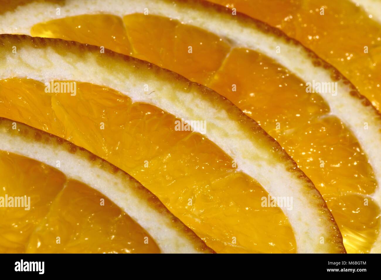 The four orange segments Stock Photo - Alamy