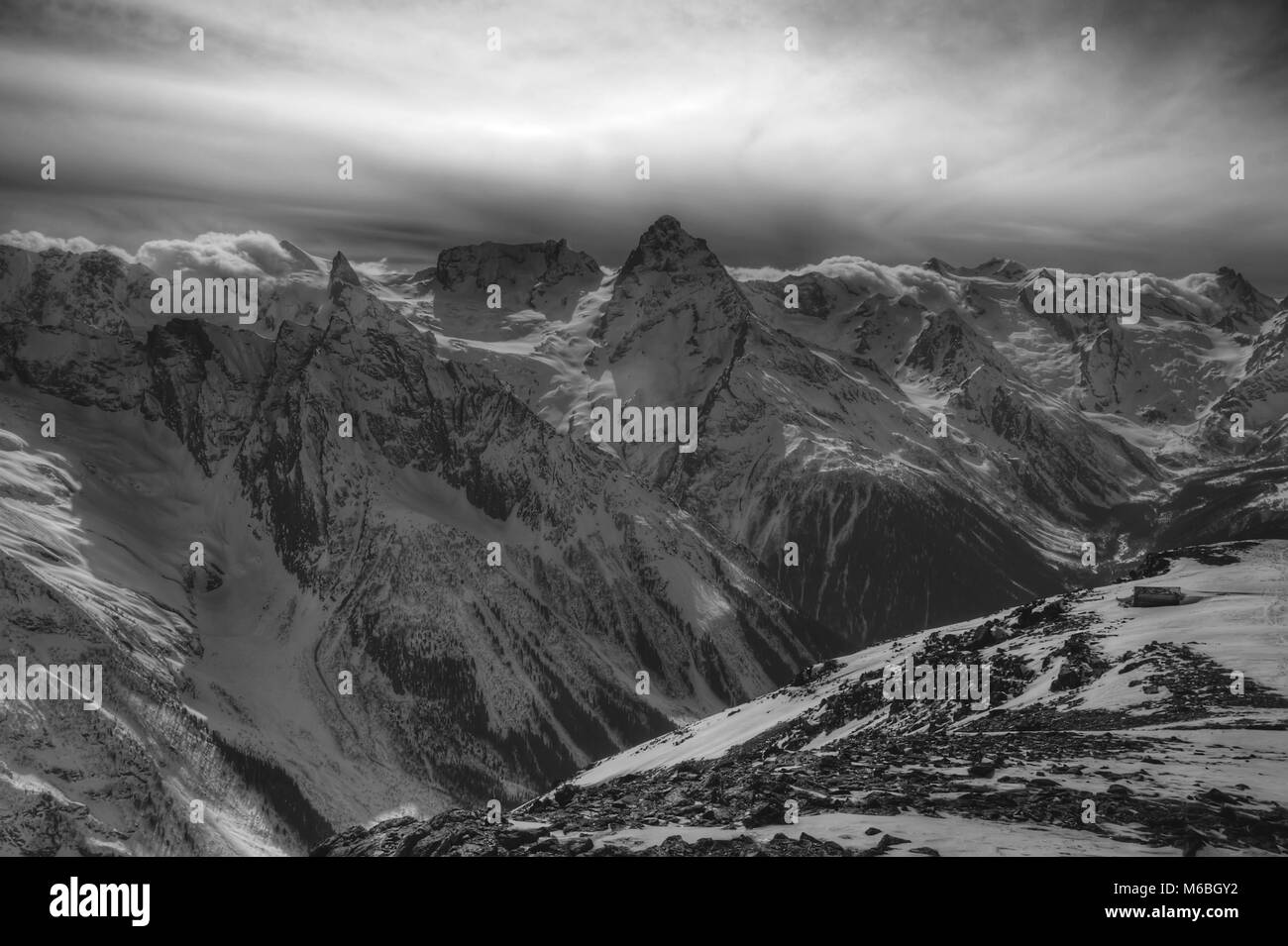 austere rocks and clouds Stock Photo - Alamy