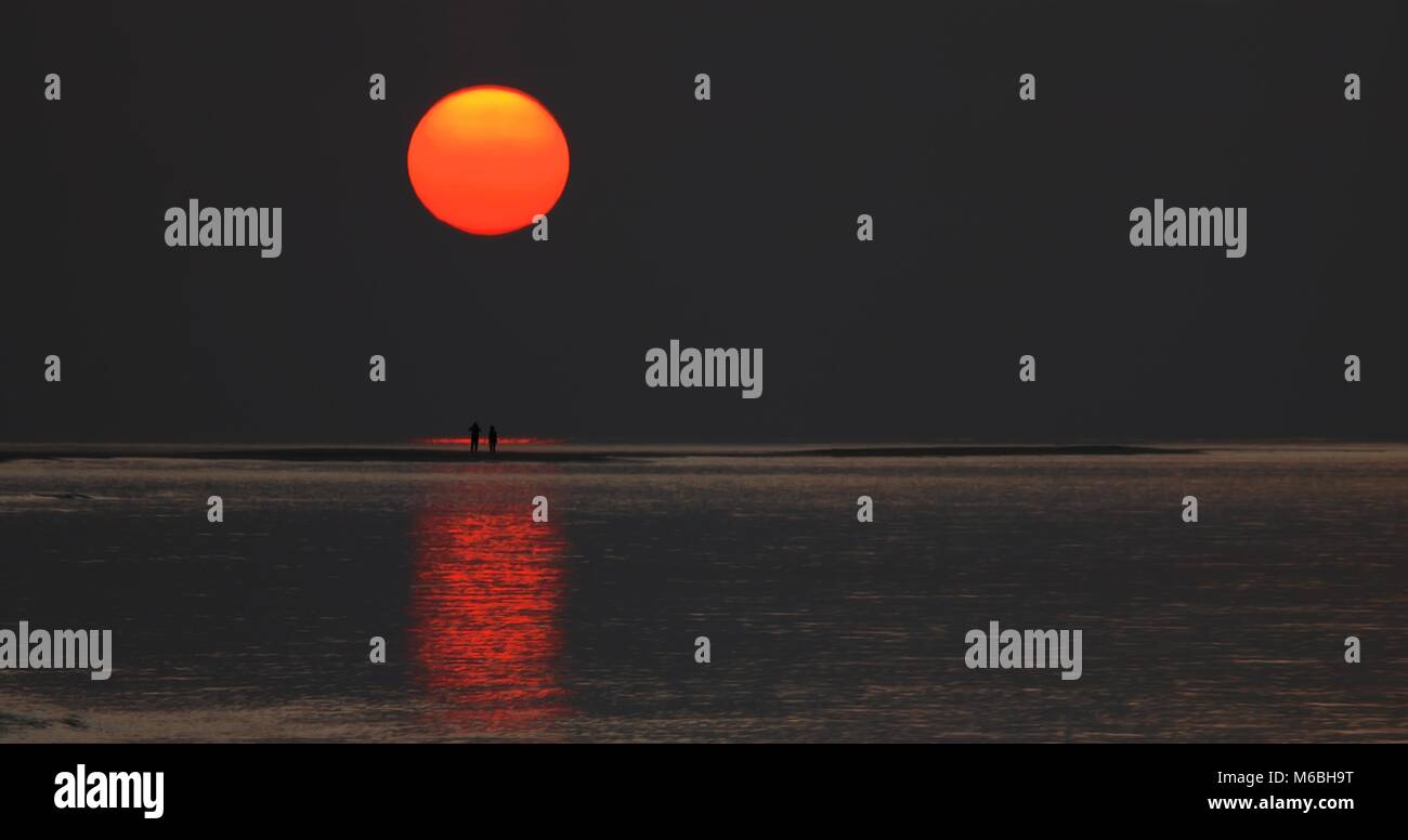 people in the country of a rising sun Stock Photo - Alamy