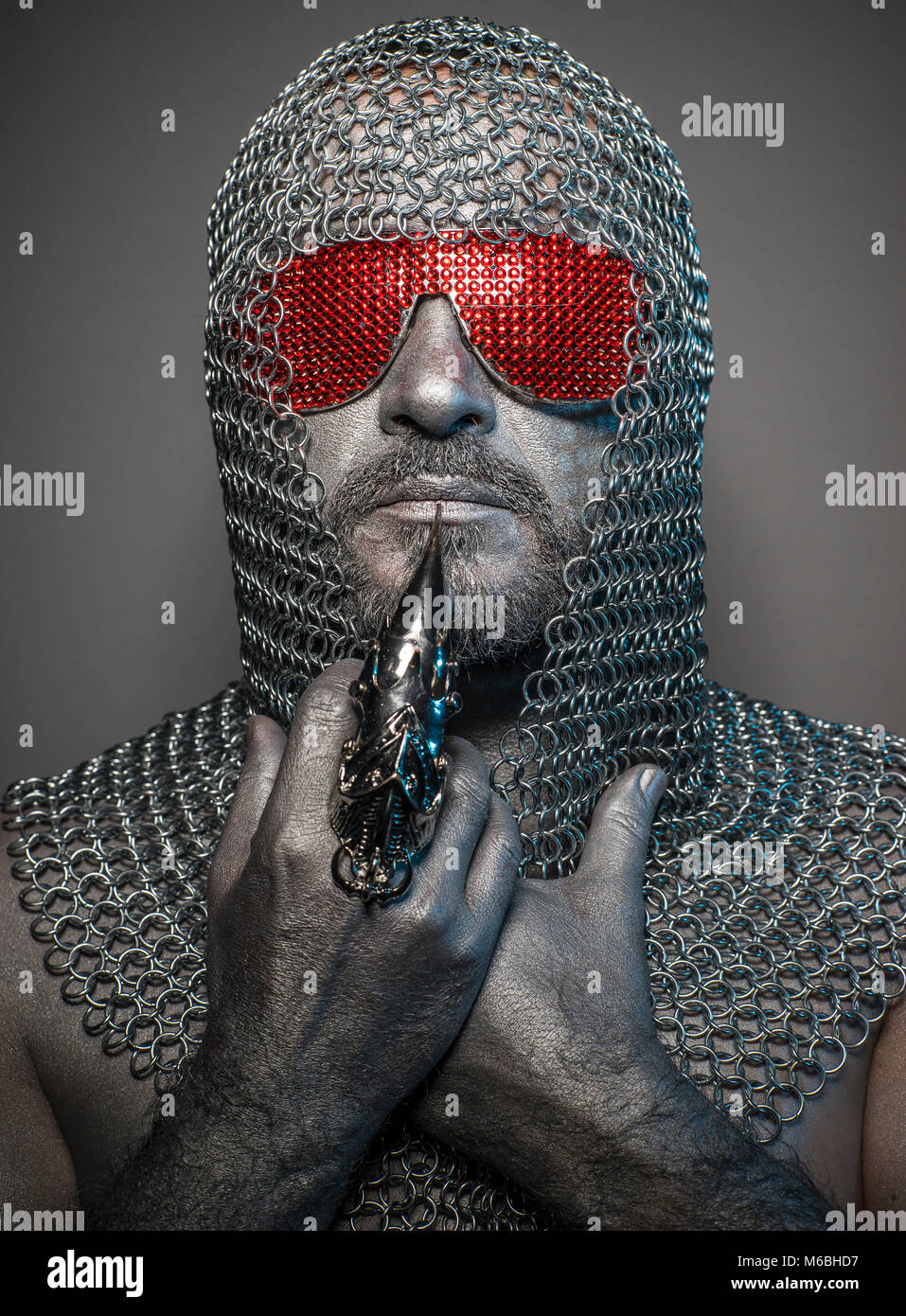 firewall, man with iron armor and red glasses, concept of protection ...