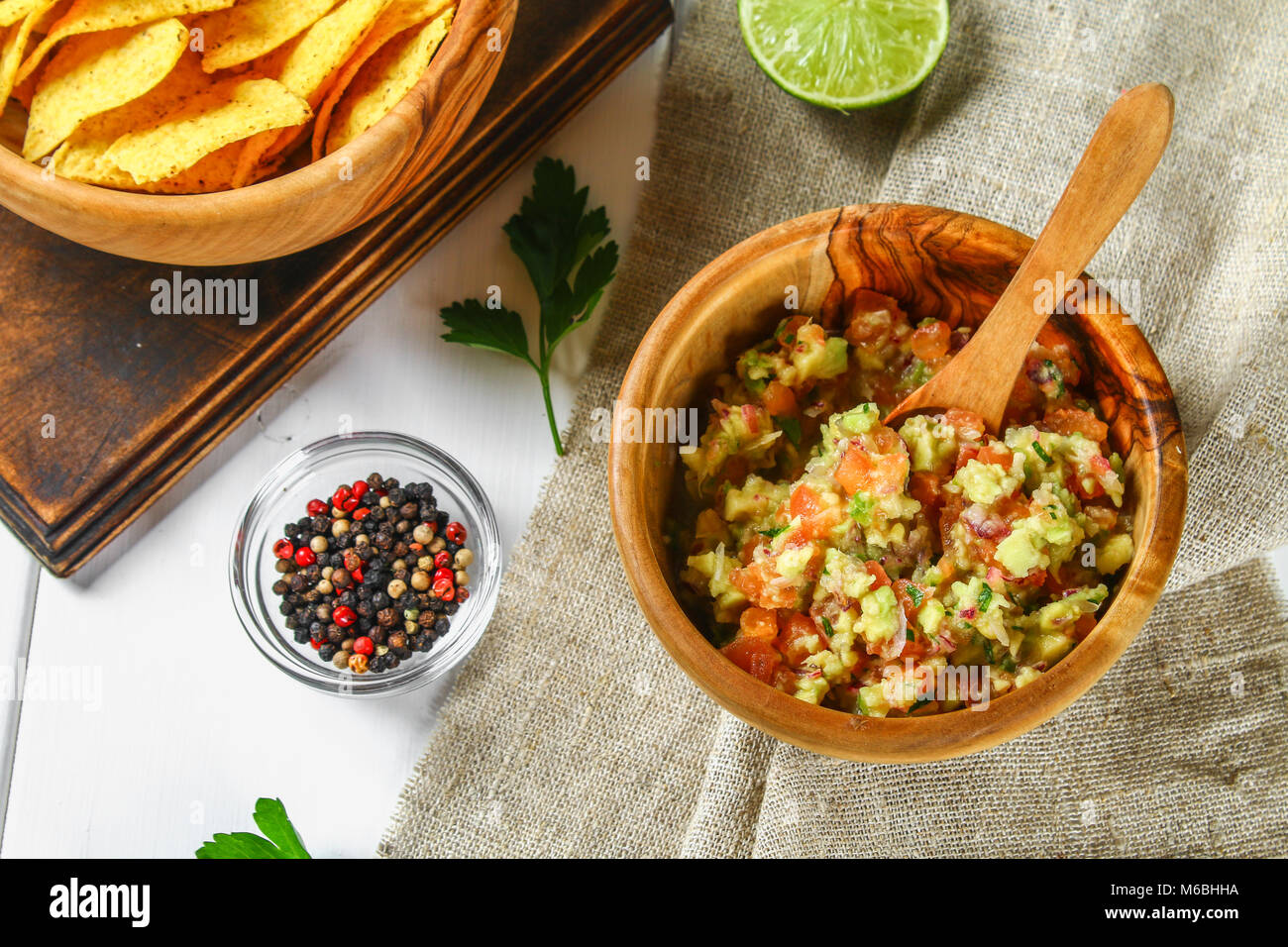 Guacomole is a traditional Mexican sauce consisting of grated avocado ...