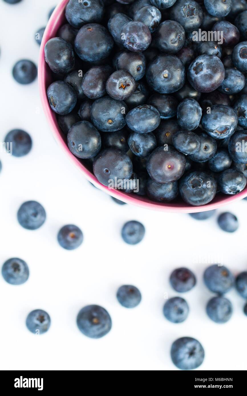 Looking down from above onto a bowlful of fresh, organic blueberries on ...