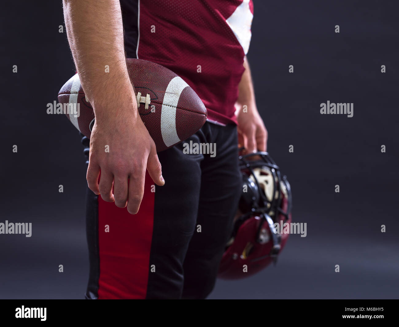 Closeup Portrait of a strong muscular American Football Player isolated ...