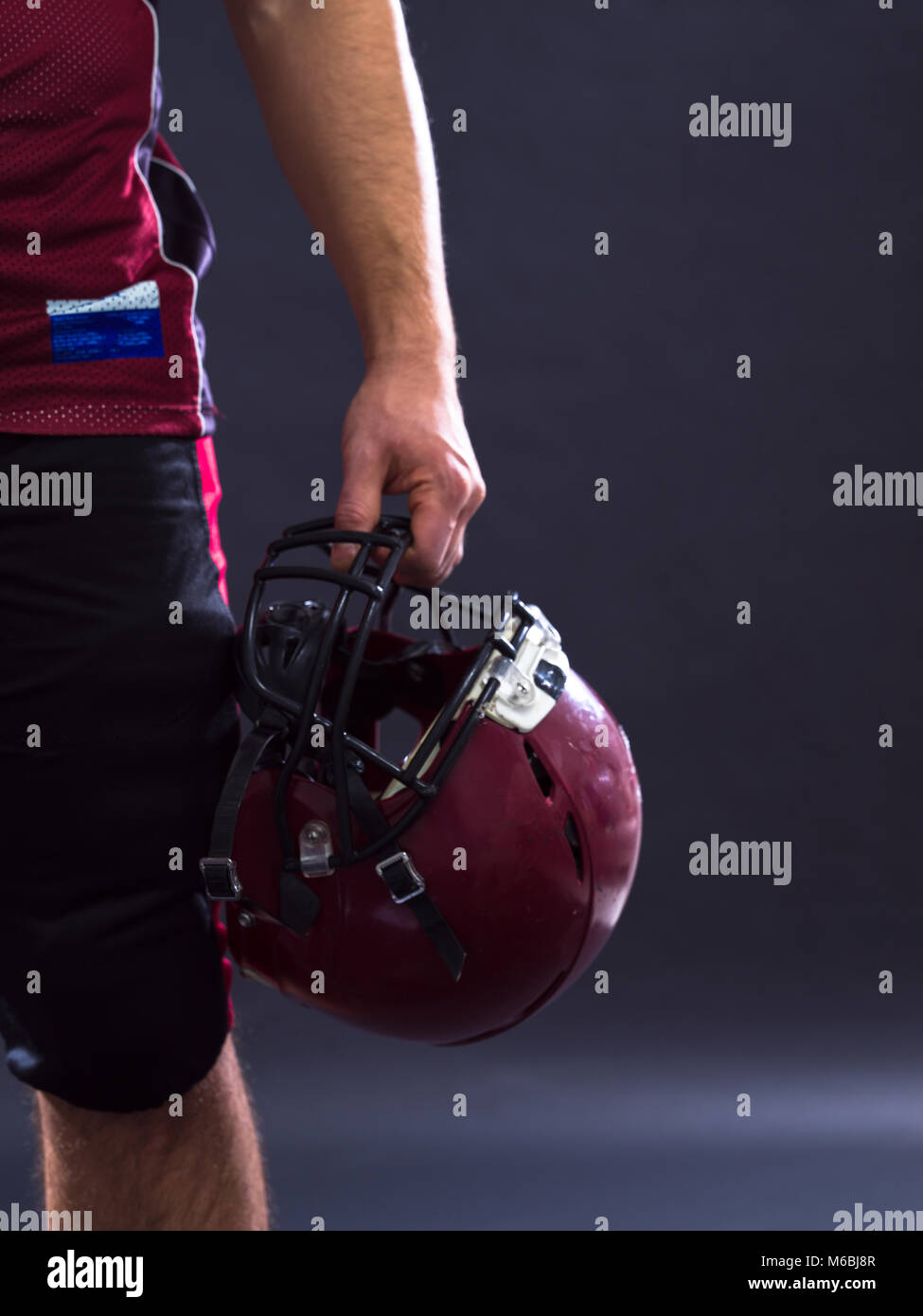 Closeup Portrait of a strong muscular American Football Player isolated ...