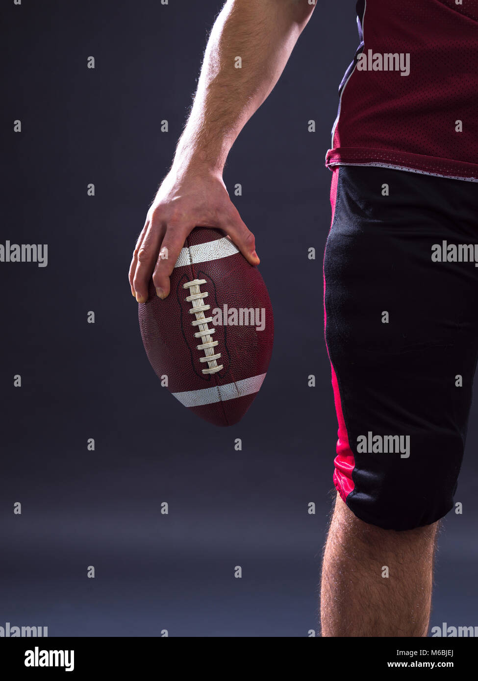 Closeup Portrait of a strong muscular American Football Player isolated ...
