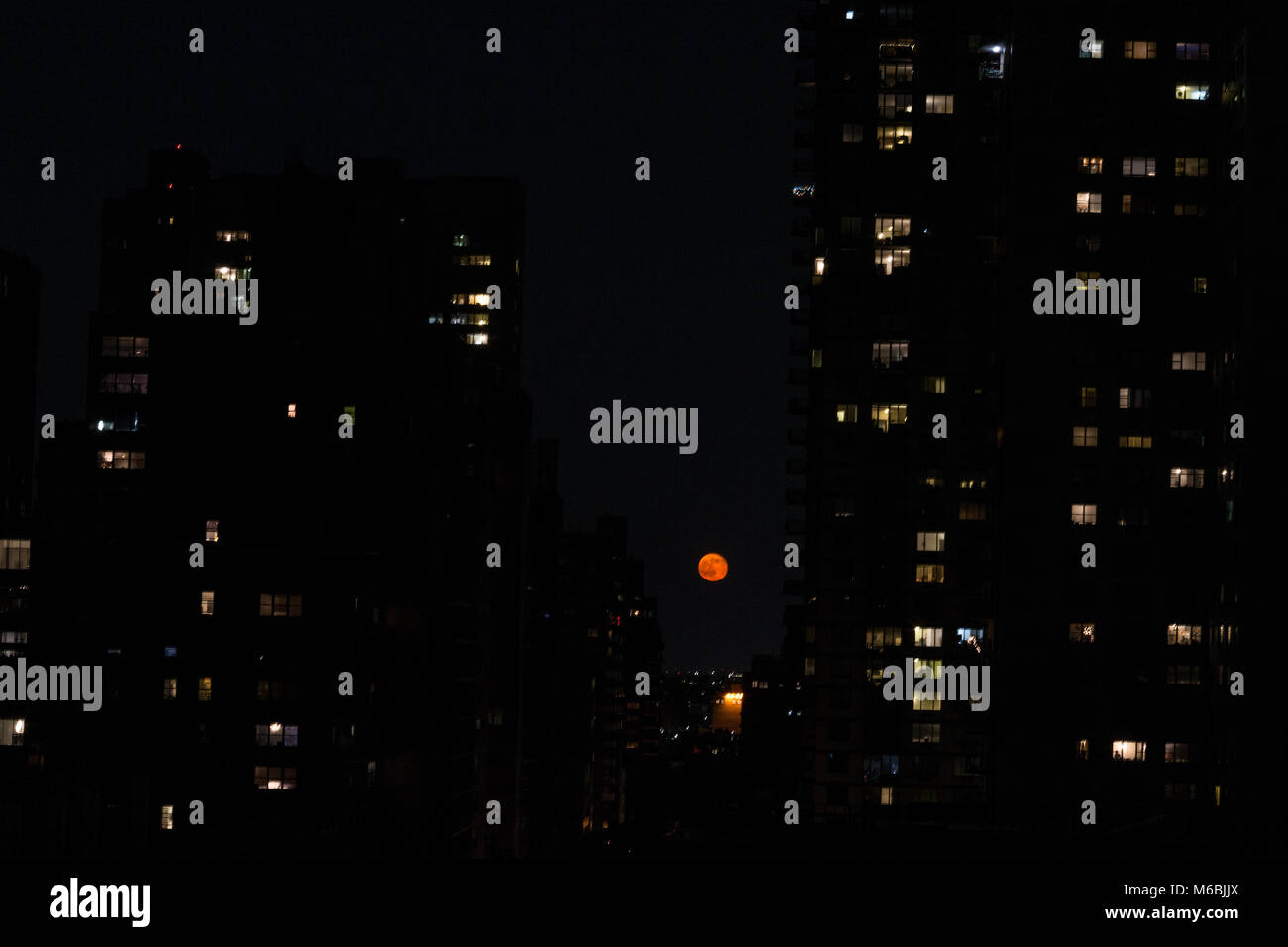 Red moon from a rooftop terrace in the Upper East Side of NYC Stock ...