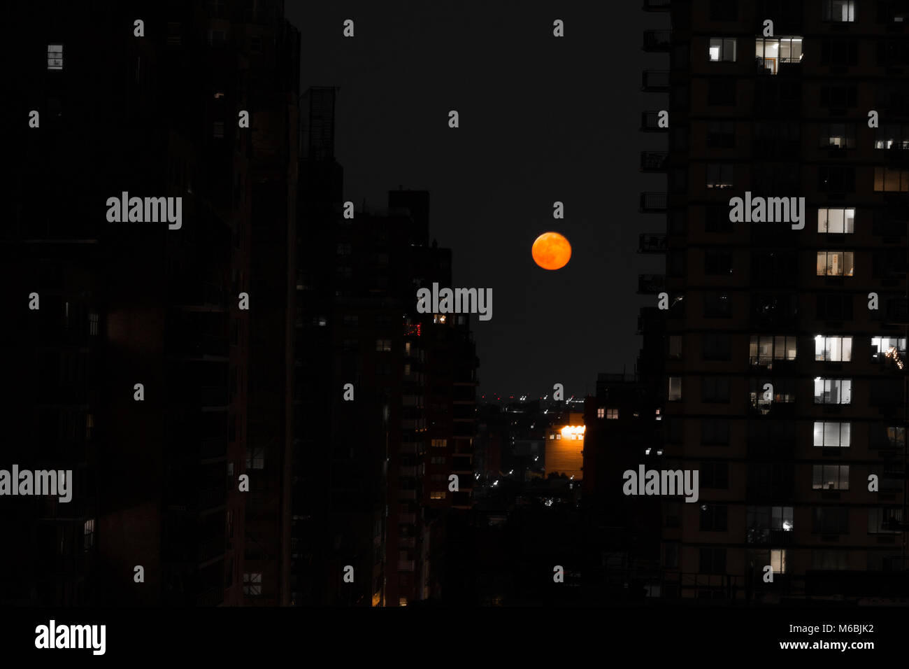 Red moon from a rooftop terrace in the Upper East Side of NYC Stock ...