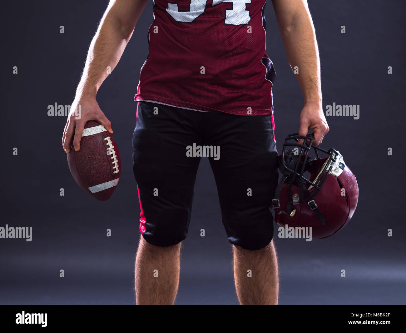 Closeup Portrait of a strong muscular American Football Player isolated ...