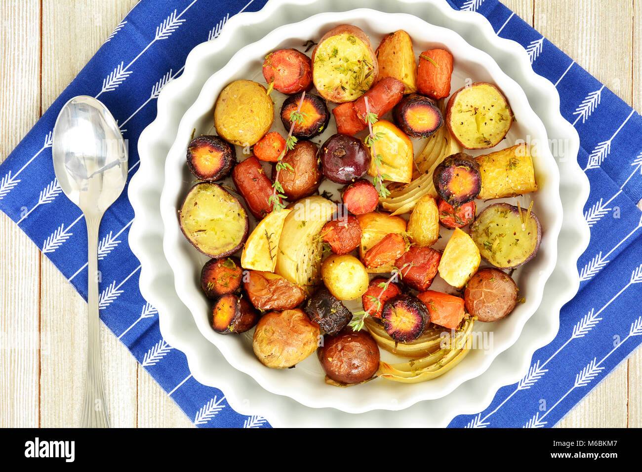 Healthy roasted root vegetables from overhead in horizontal format and ...