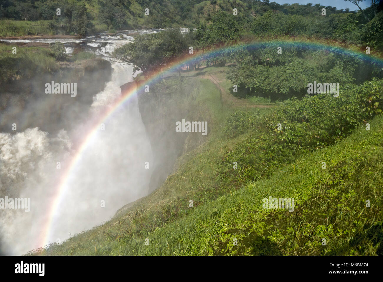 Rainbow created by the waterfall; Murchison's Falls National Park ...