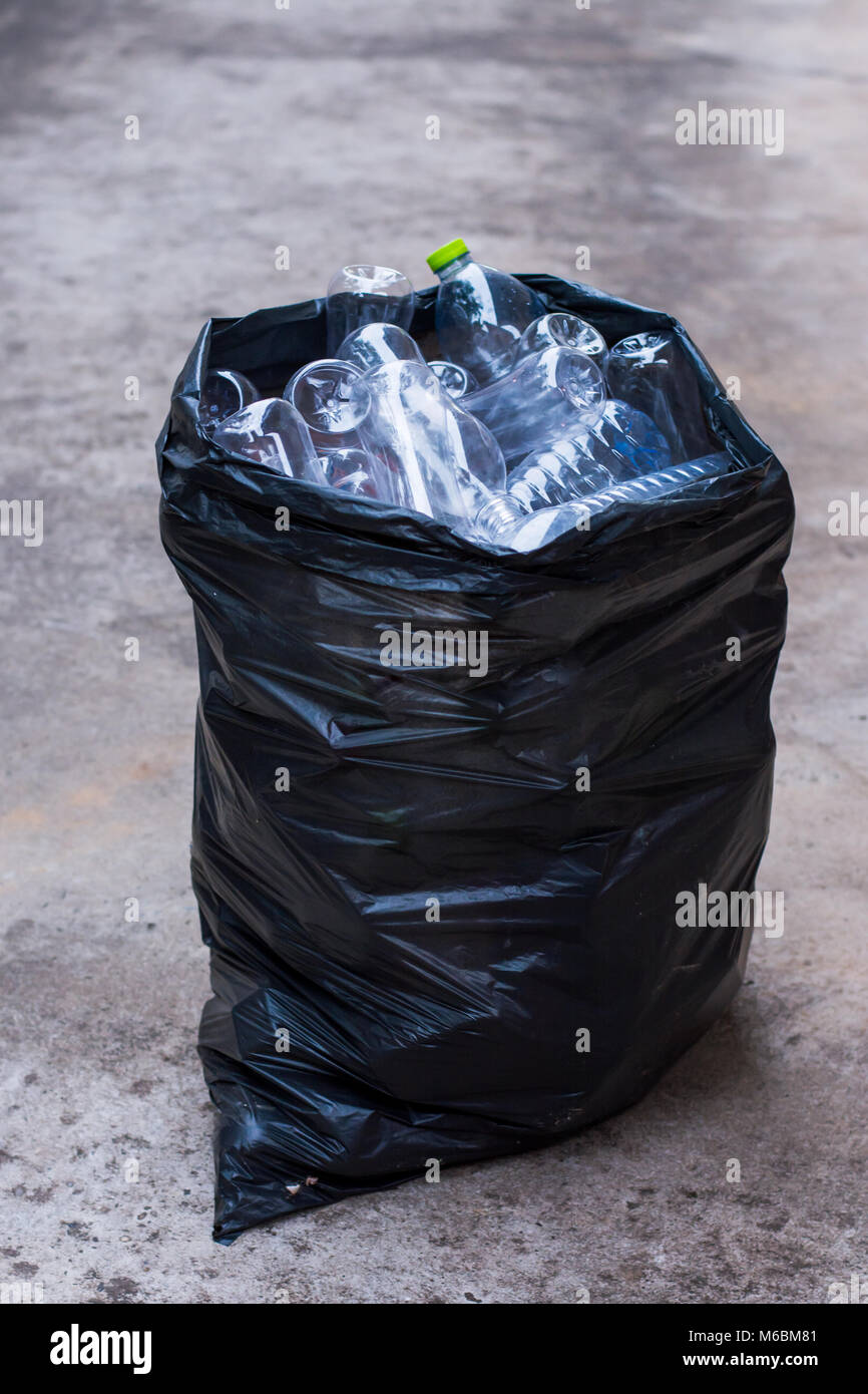 pile recyclable plastic bottles in trash bag Stock Photo - Alamy