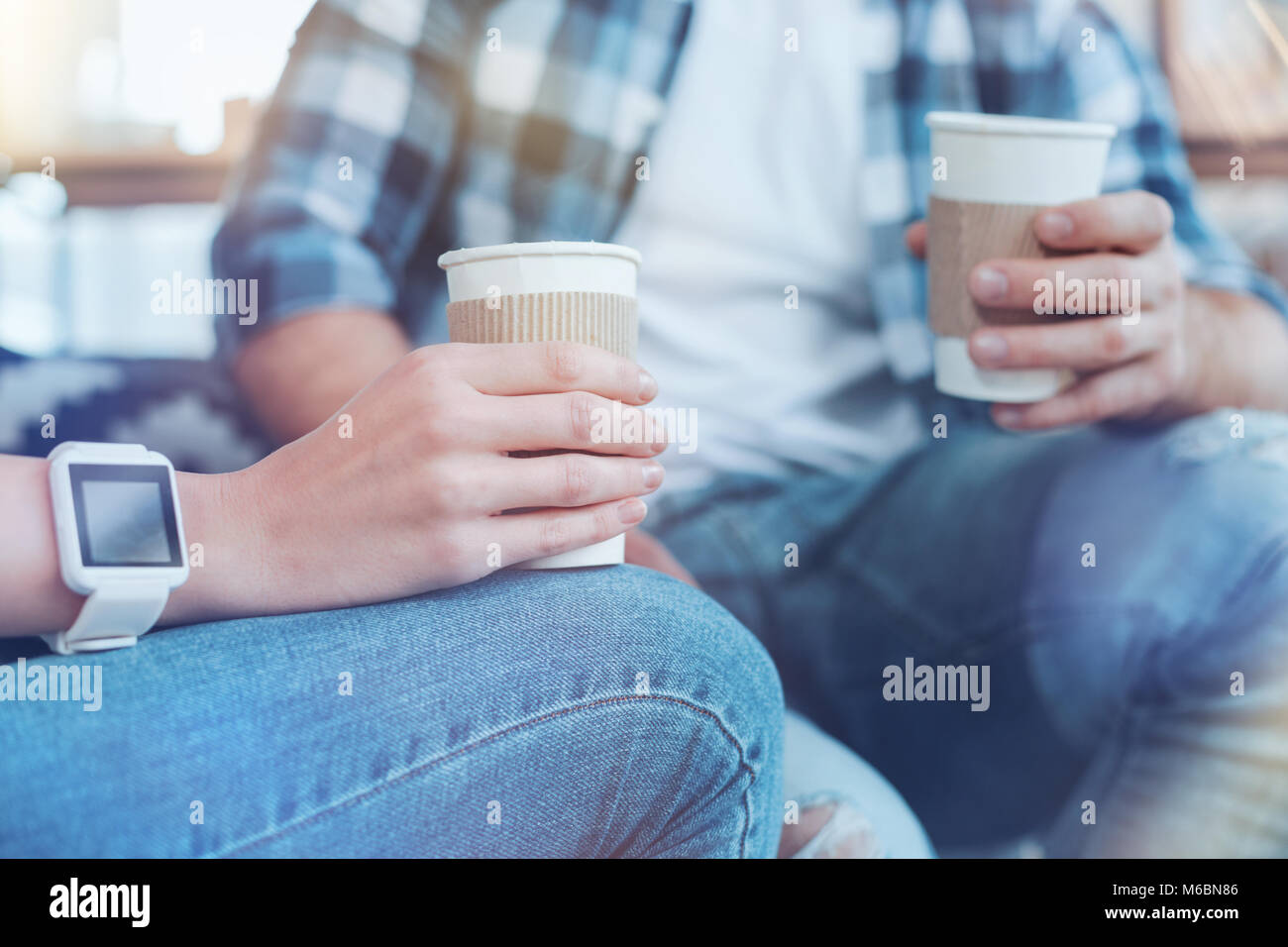 Close up of young people while having time to relax Stock Photo - Alamy