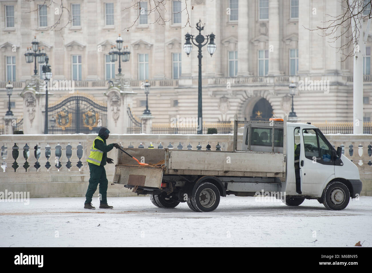 1 March 2018. Snow covered pathways are gritted in Green Park, London ...