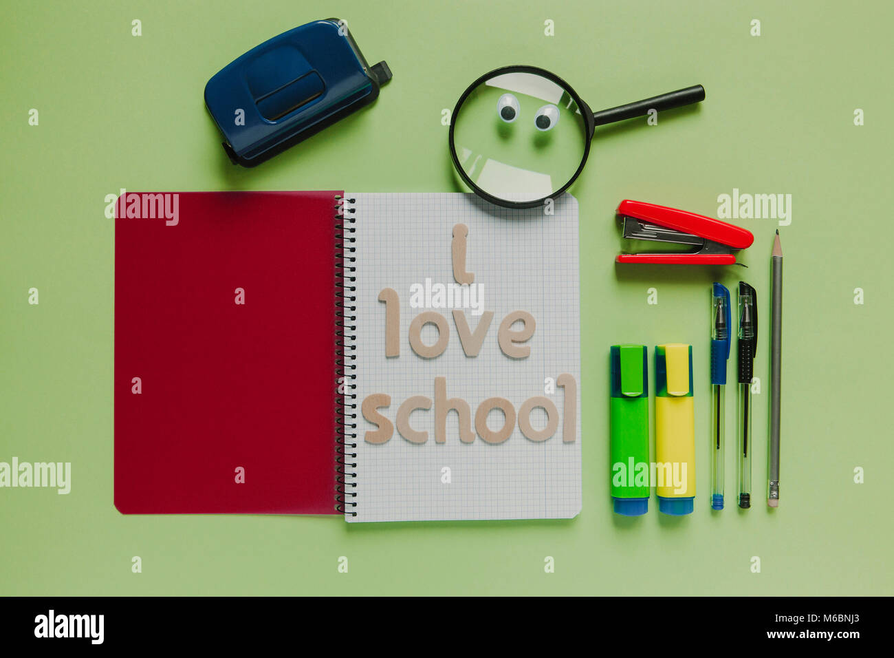 Back to school still life concept with green color background Stock ...