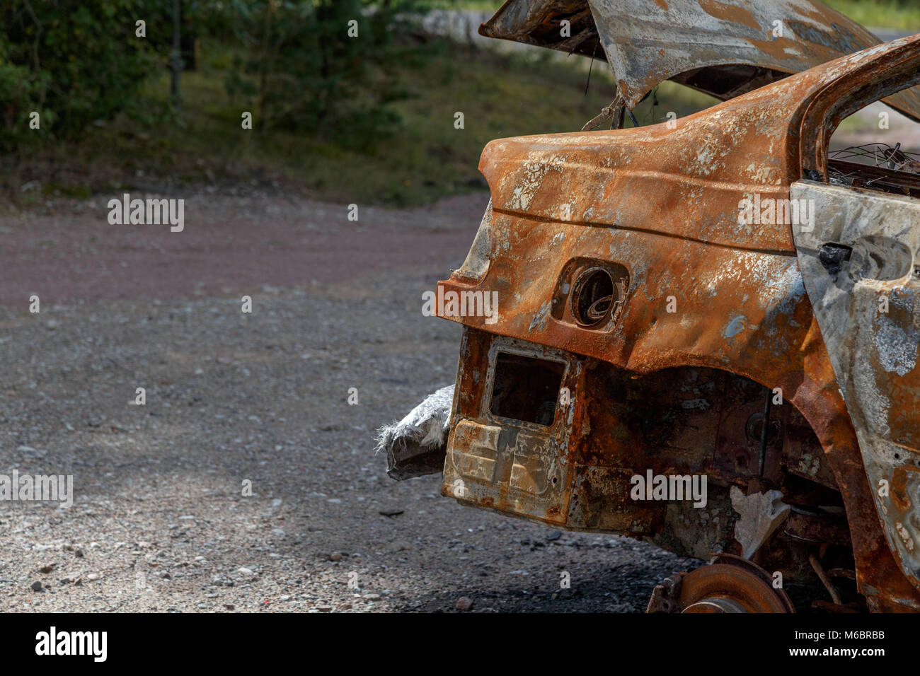 Burned rusty car Stock Photo - Alamy