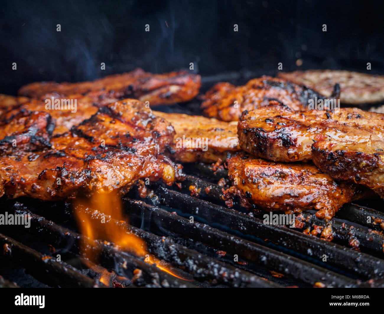 Meat on grill, barbecue Stock Photo - Alamy