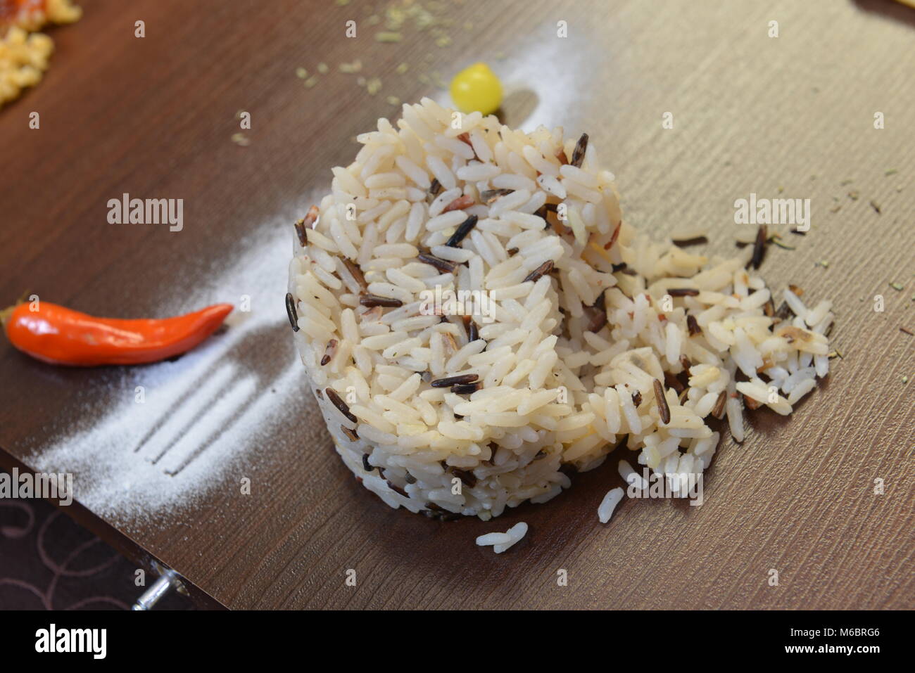 fried rice on white plate in restaurant. asian food. Risotto with ...