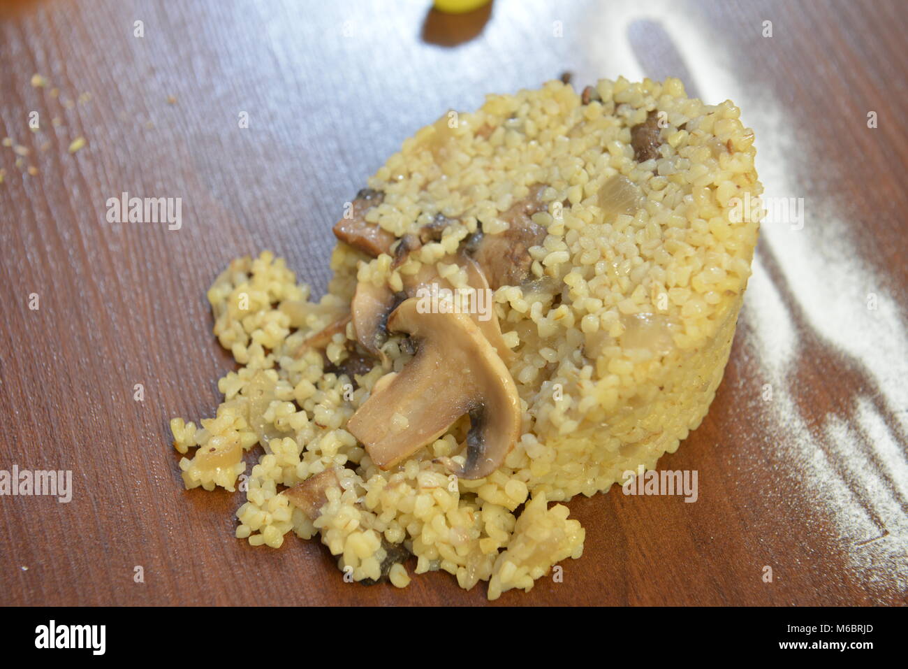 fried rice on white plate in restaurant. asian food. Risotto with ...