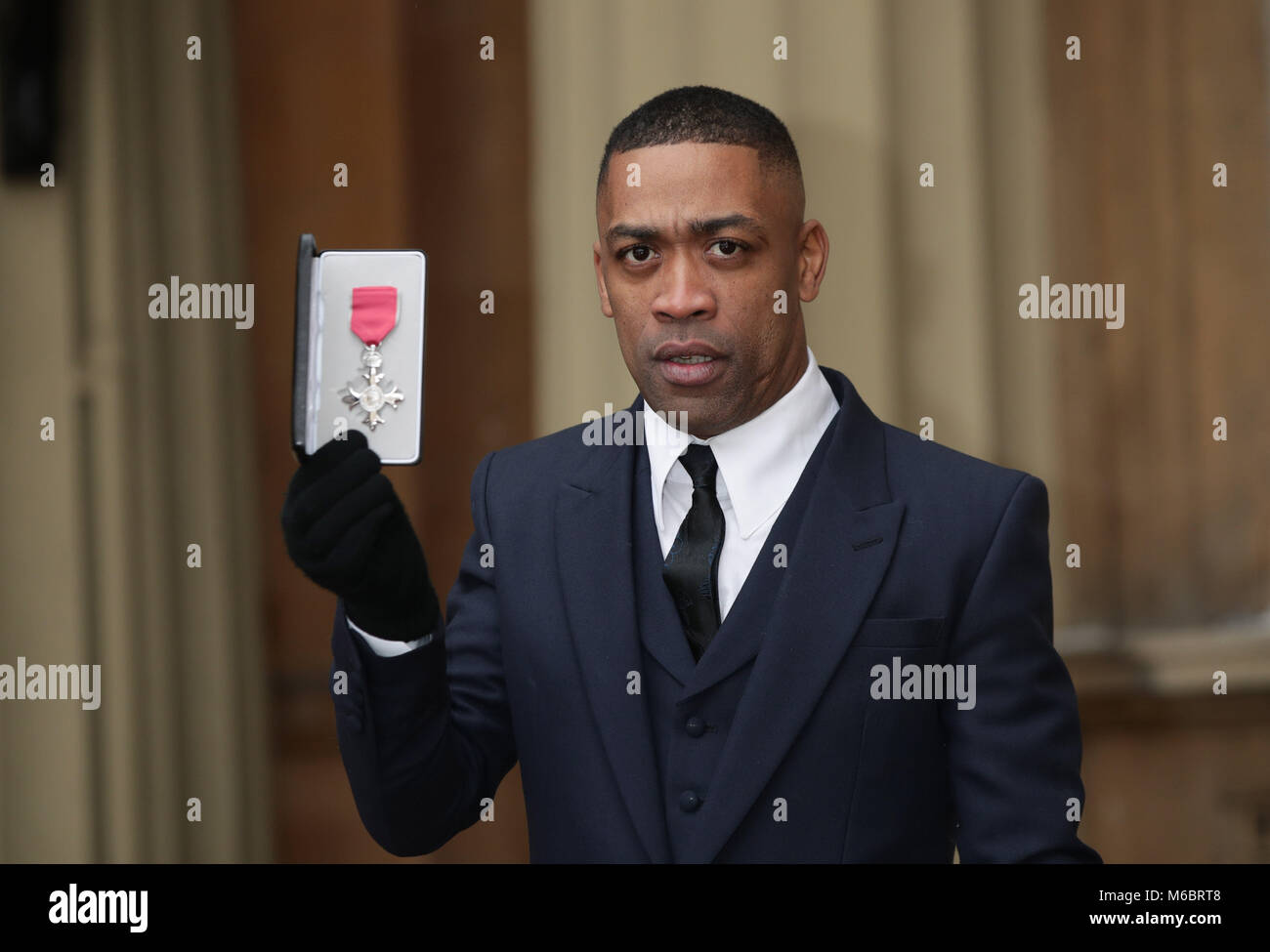 Musician Wiley, also known as Richard Cowie Jnr, holds his MBE ...