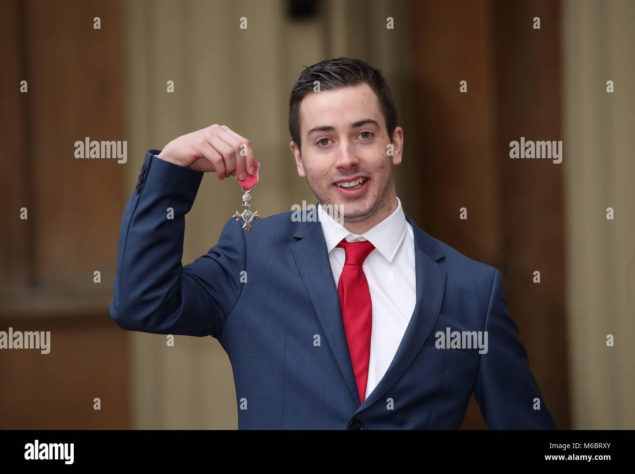 Charlie Fogarty with his MBE, awarded for services to young people in ...