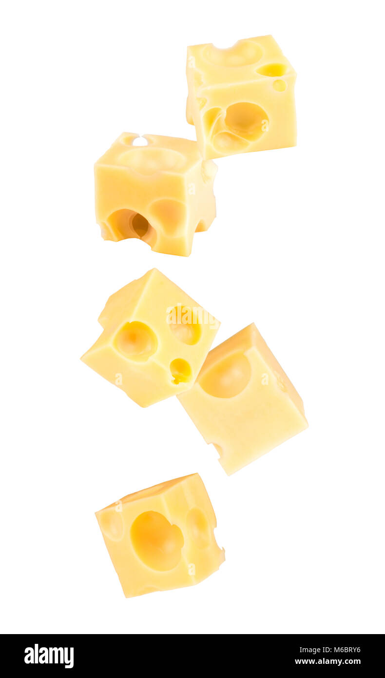 Falling cubes of cheese isolated on white Stock Photo - Alamy