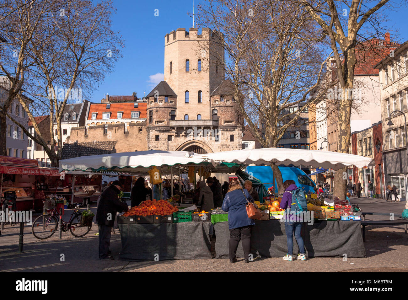 Germany, Cologne, market in front of the historic town gate ...