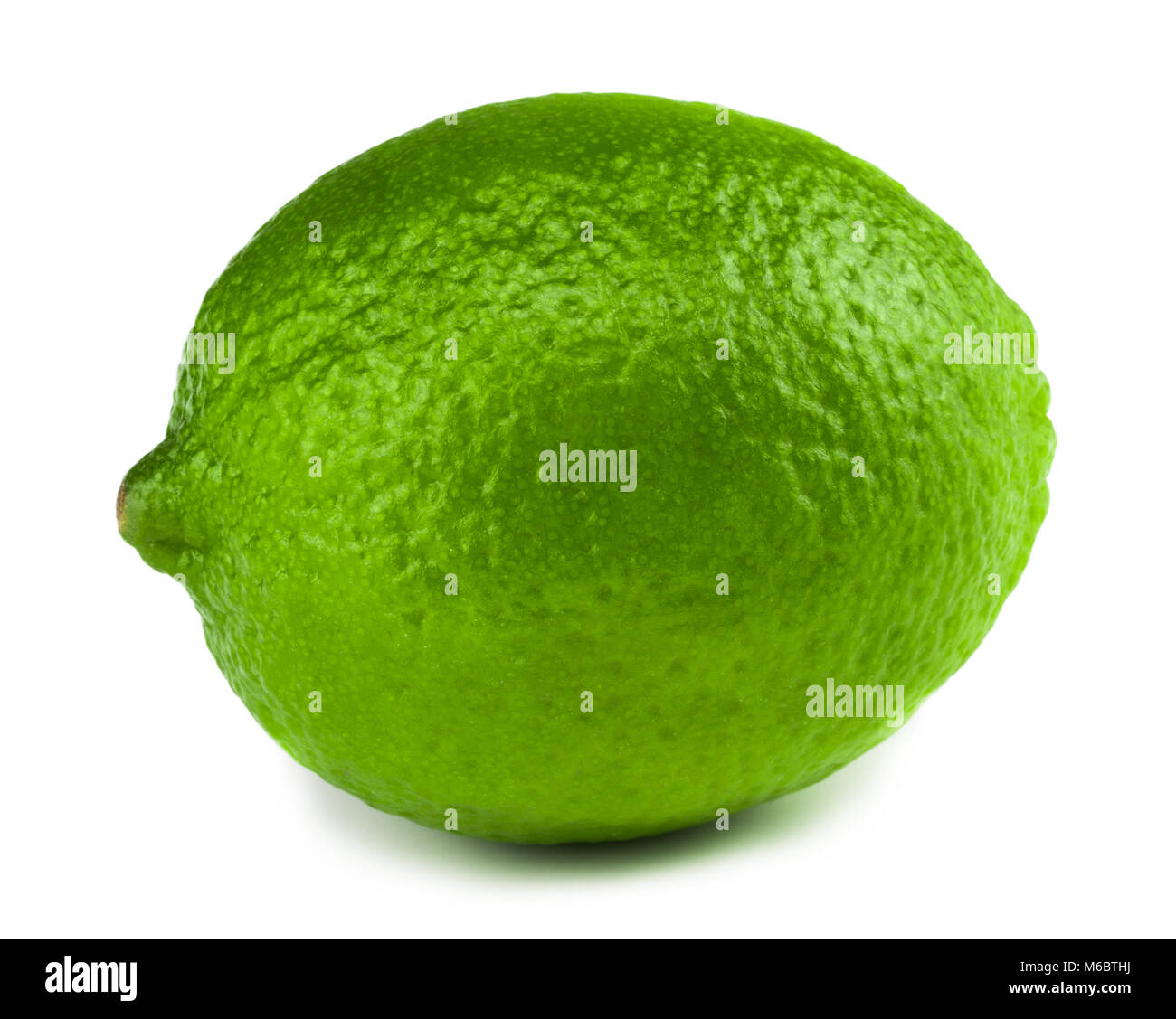 single ripe lime isolated on white background Stock Photo - Alamy